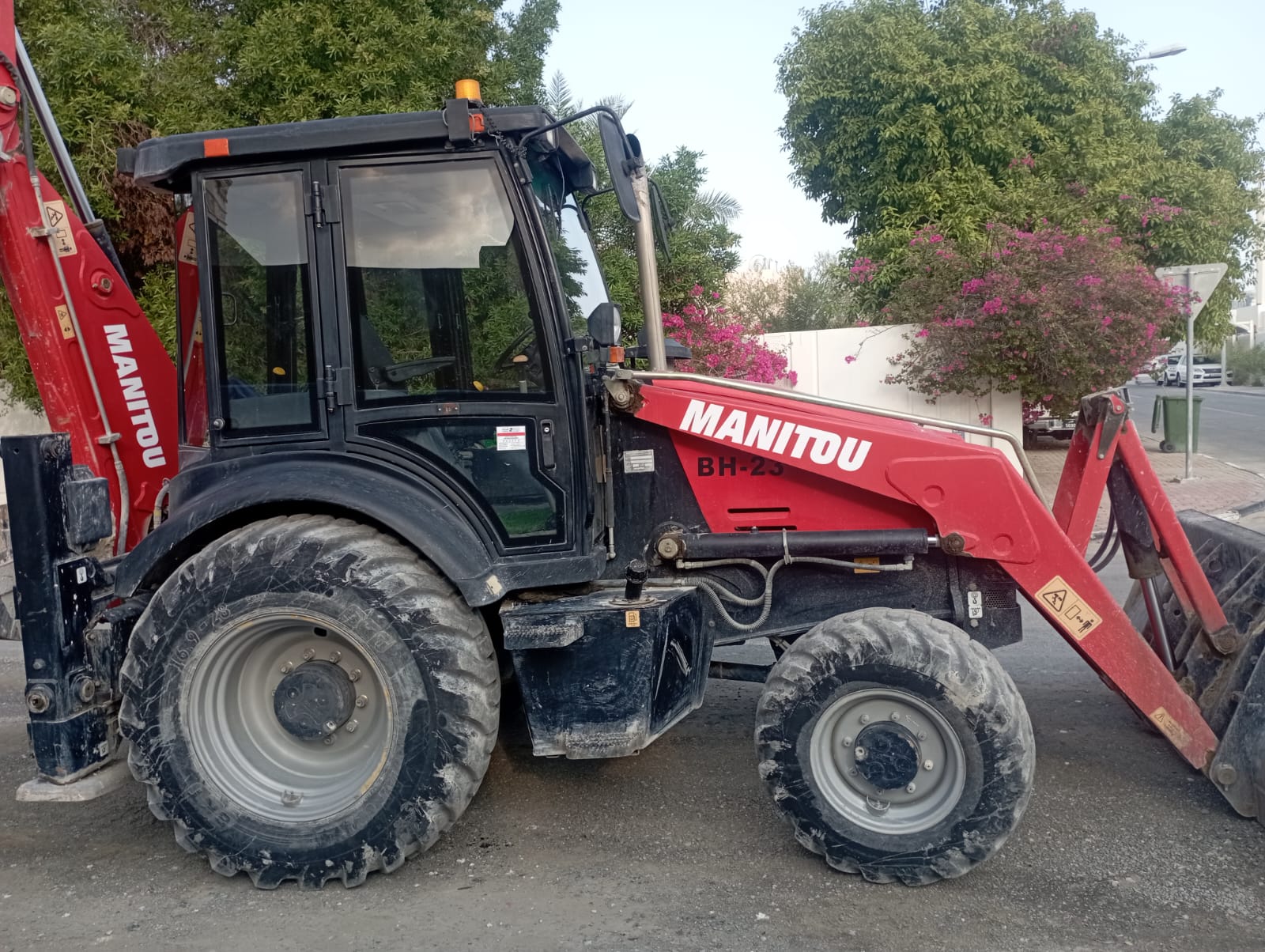 Equipment Hound. Equipment marketplace. MANITOU TLB 818S Backhoe Loader