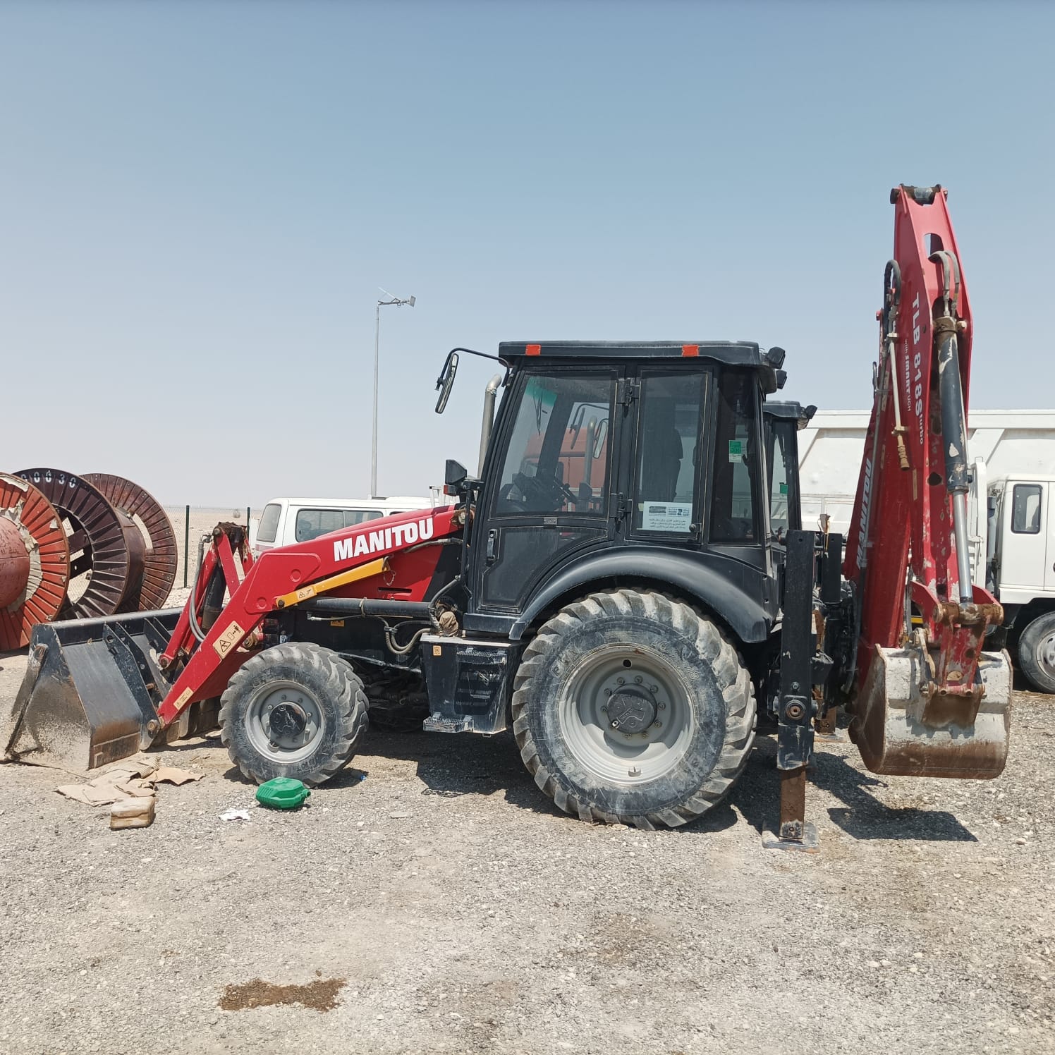 Equipment Hound. Equipment marketplace. MANITOU TLB 818S Backhoe Loader